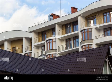 Architectural Details Of Modern High Apartment Building Facade With