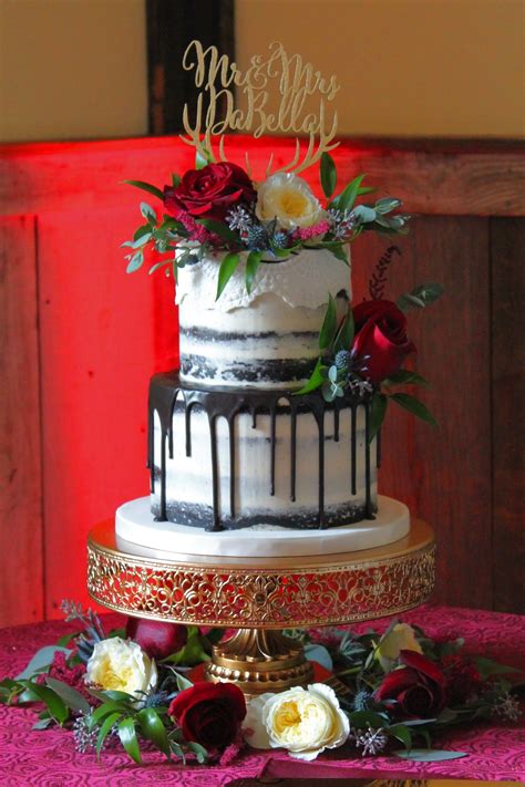 Chocolate Semi Naked Drip Cake With Fresh Flowers From Four Oaks Bakery