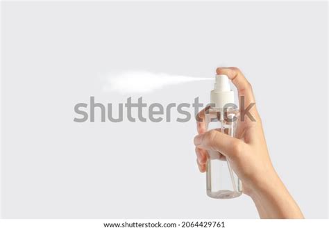 Hand Holding Small Spray Bottle Over 697 Royalty Free Licensable Stock