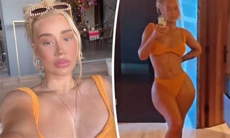 Iggy Azalea Flaunts Her Eye Popping Curves In A Bright Orange Bikini