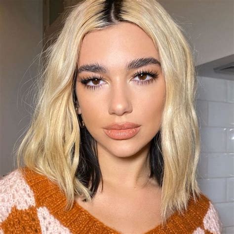 Dua Lipa Heats Up The Red Carpet In Sheer Dress At Barbie Premiere