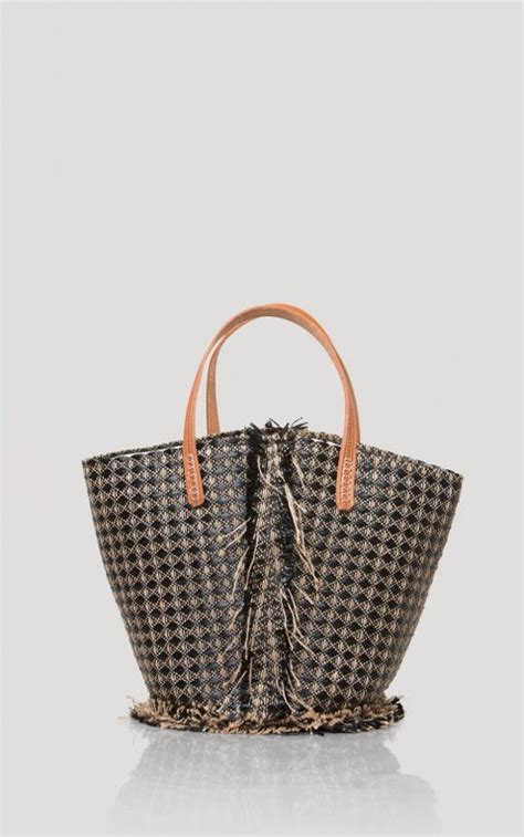 23 Chic Beach Bags To Tote Around All Summer Long Woven Beach Bags