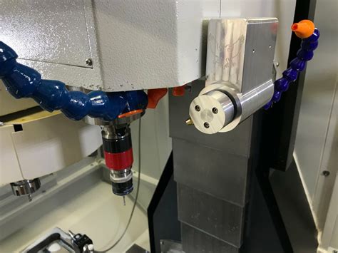 accublast remote control cnc coolant nozzle