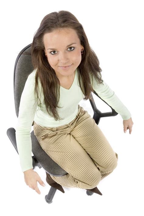 Woman Sitting On The Office Chair Talking To The Mobile Phone Stock