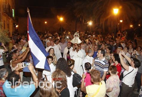 Los cubanos en Valencia salen en procesión con la Virgen de la Caridad