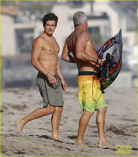 Orlando Bloom Looks Ripped While Shirtless On Malibu Beach Photo