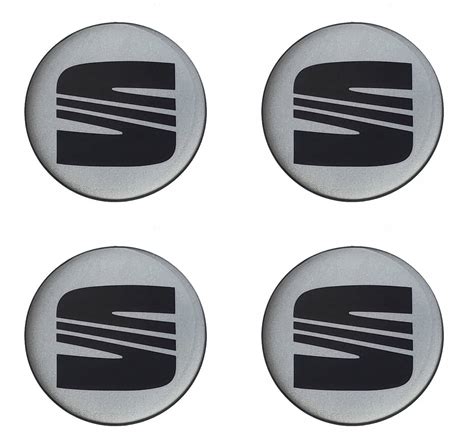 NAKLEJKI NA DEKIELKI KOŁPAKI FELGI DO SEAT 56 MM SREBRNE TŁO ST 5 6 CM