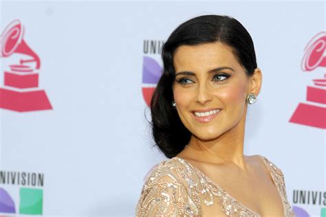 Nelly Furtado Shows Off Incredible Body At In Campaign For Kim