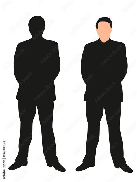 Isolated Silhouette Of A Man Standing Hands Behind His Back Stock
