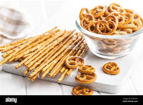 Mini Pretzels And Salted Sticks Crusty Salted Snack On A Cutting Board