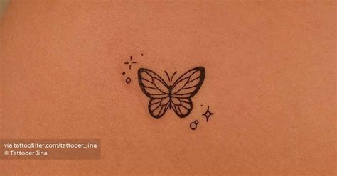 Small Butterfly Tattoo Located On The Shoulder