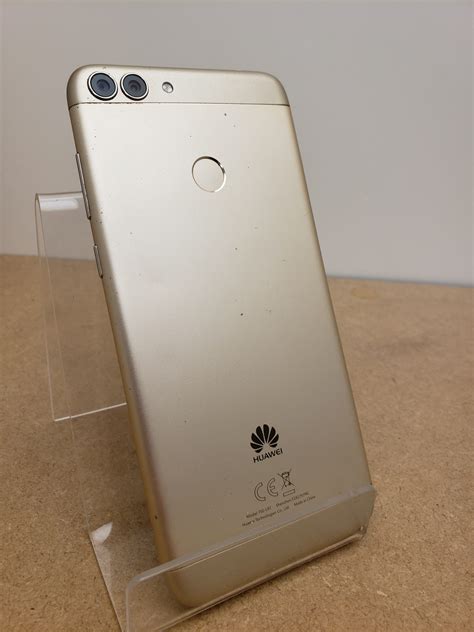 Huawei P Smart 32GB Gold FIG LX1 Unlocked Money Station