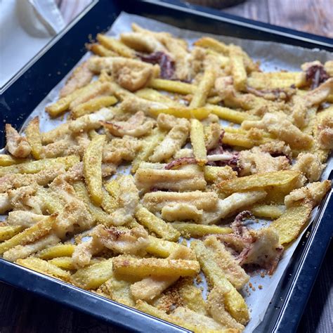 Calamari E Patate Gratinati Una Famiglia In Cucina
