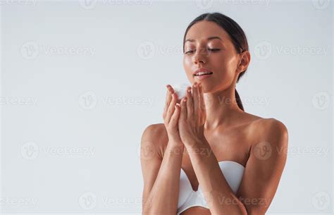 Conception Of Beauty Using Cream Woman With Slim Body In Underwear Is