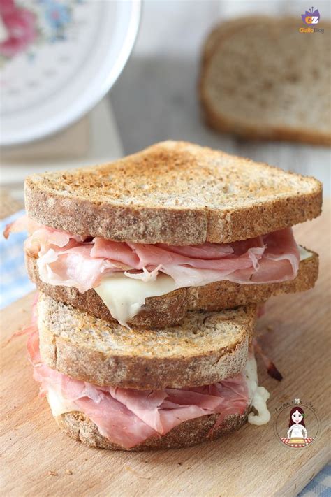There Is A Sandwich With Ham And Cheese On It
