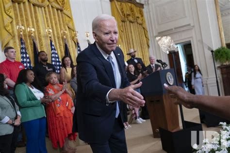 Photo President Joe Biden And Congressional Members Celebrate One Year