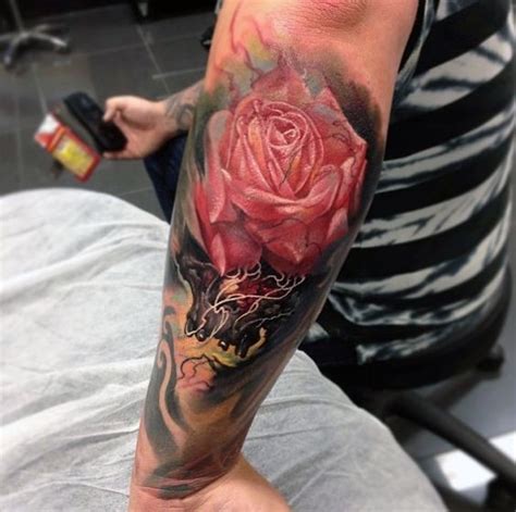 Magnificent 3D Style Big Colored Detailed Rose Tattoo On Forearm With