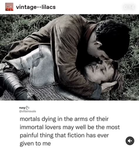 Two People Laying On The Ground Kissing Each Other With Caption That