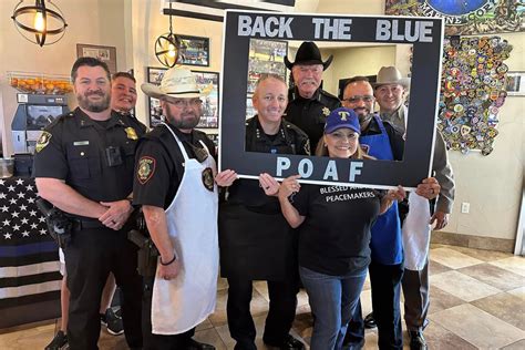 Local Law Enforcement Swaps Handcuffs For Aprons At Dining For
