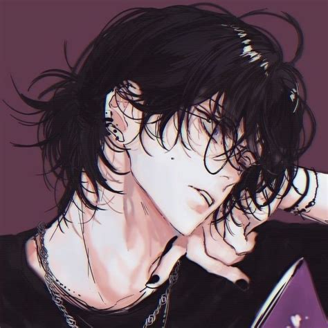A Man With Long Black Hair Holding His Hand To His Face