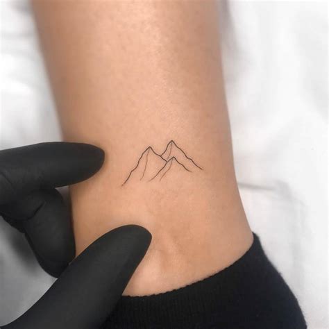 Fine Line Mountain Tattoo On The Ankle