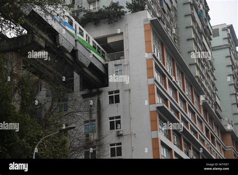 A Subway Train Of Chongqing Light Rail Line 2 Arrives At The Liziba