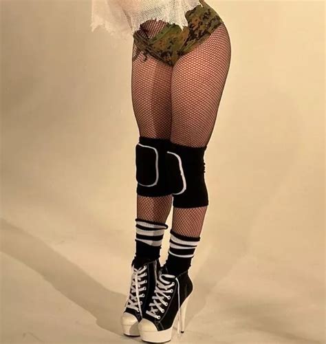 Billie Eilish Strips To Hot Pants And Fishnets To Show Off Legs In High