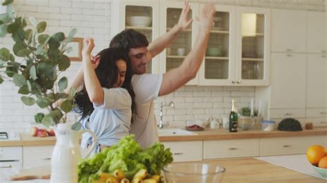 Premium Photo Sexy Couple Dancing At Kitchen In Slow Motion Young Lovers Having Fun At Home