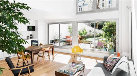 Comment aménager son salon avec baie vitrée Côté Maison