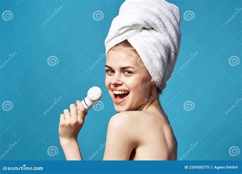 Pretty Woman Naked Shoulders With Towel On Head Face Massager Clean