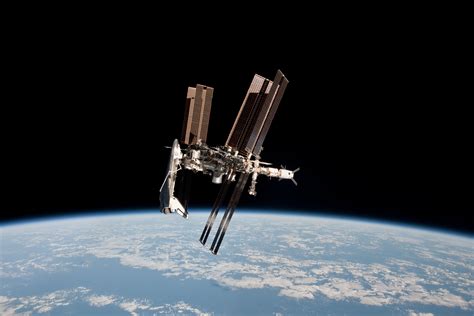 El Transbordador y la Estación Espacial fotografiados juntos
