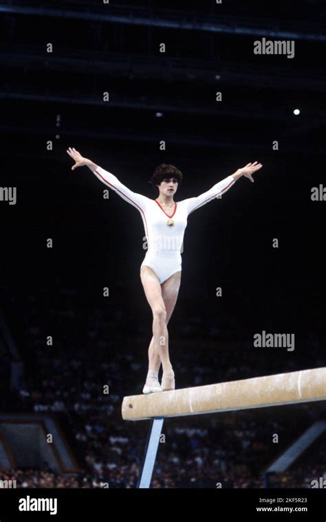 Romania S Nadia Comaneci In Action On The Beam Stock Photo Alamy