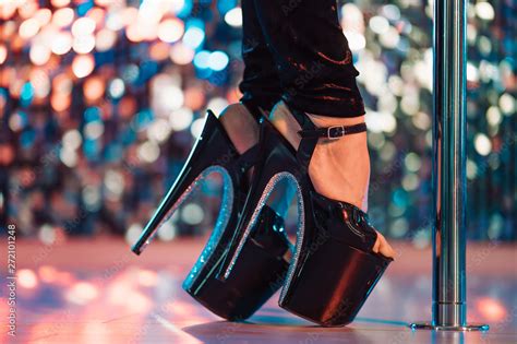 Heels Of Sexy Woman Pole Dancing Or Striptease With Pylon In Night Club Stripper Girl On