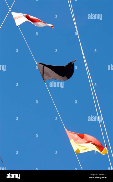 Tres banderas náuticas para señales a otros buques Fotografía de stock