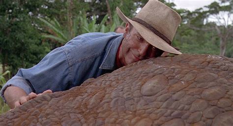 WIRE Buzz Jurassic World S Sam Neill Reunites With His Trusty Hat