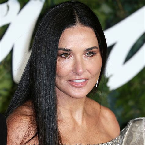 Demi Moore Shows Off Her Incredible Body In A Pink String Bikini While