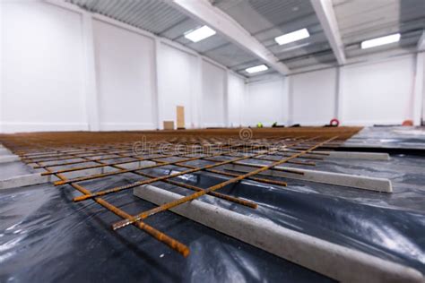 Floor Concrete Reinforcement At Warehouse Construction Site Stock Photo