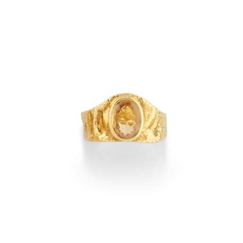Sette Anelli E Un Paio Di Orecchini In Oro Giallo 18K E Pietre Colorate