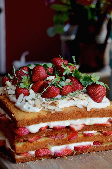 Naked Strawberry Almond Cake With Honey Rose Cream Cheese Frosting