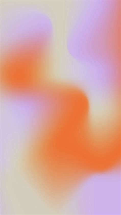 Blurry Image Of An Orange And Pink Object