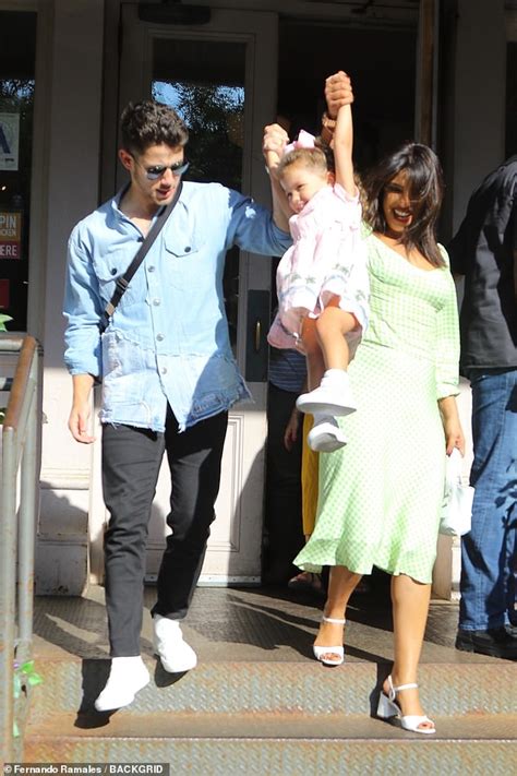 Priyanka Chopra Oozes Charm In A Gingham Dress As She Lifts Up Her
