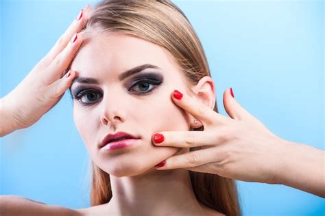 Premium Photo Portrait Of Beautiful Female Model On Blue Background