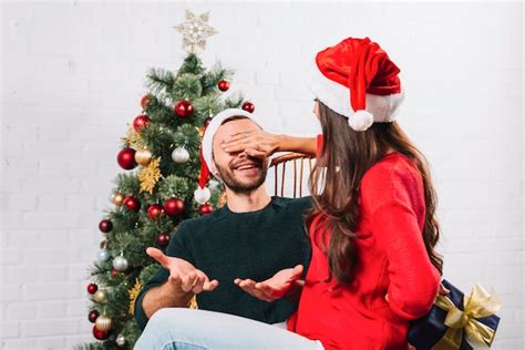 Free Photo Woman Closing Eyes To Man By Hand