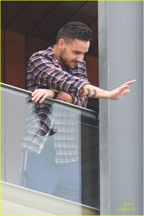 Shirtless Liam Payne Blows Kisses To Fans From Hotel Balcony Photo