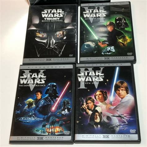 Four Star Wars Dvd S Are On Display