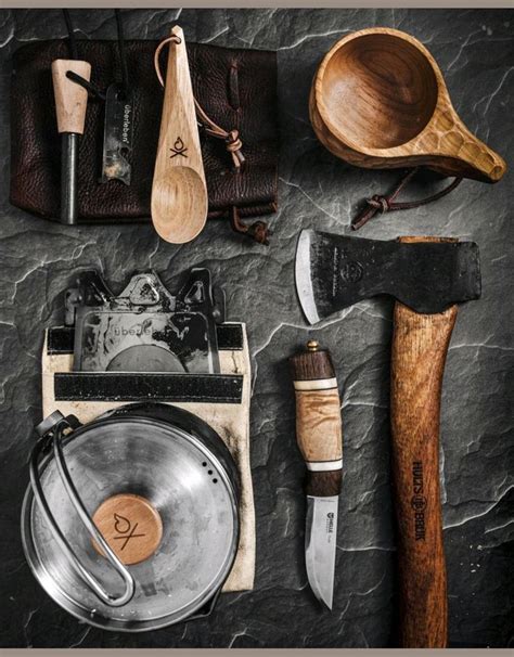An Assortment Of Kitchen Utensils Laid Out On Top Of A Stone Countertop