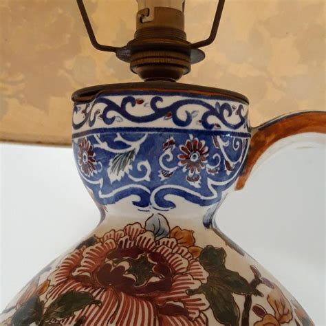 Lampe en faience fine de GIEN décors fleurs de pivoines années 70