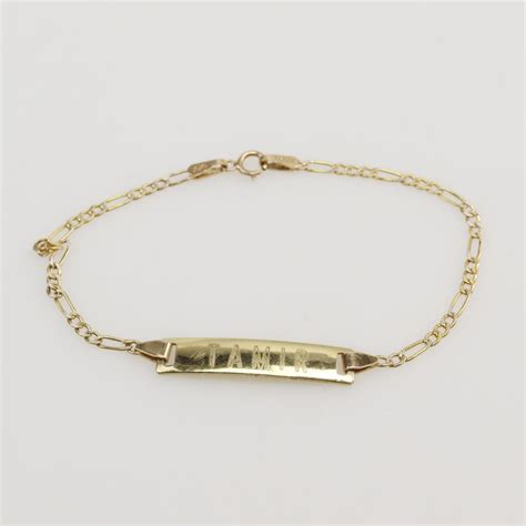 10kt Gold Figaro Chain Name Plate Bracelet Property Room