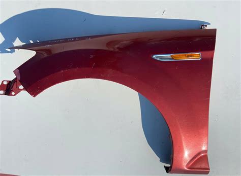 BŁOTNIK LEWY PRZEDNI FORD MONDEO MK4 06 12 Z6 FORD MONDEO MK4 BŁOTNIK
