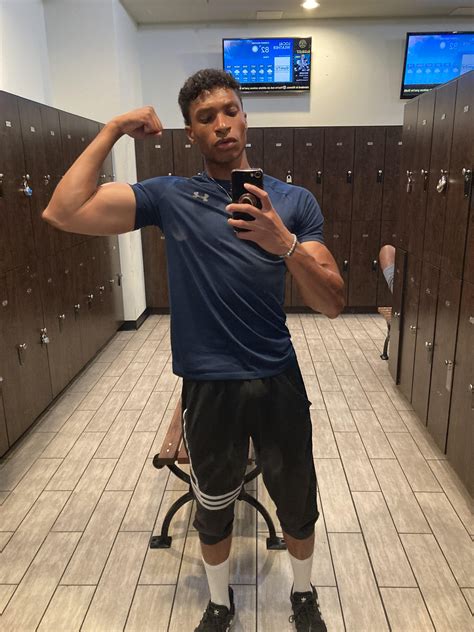 Slight Bicep Flex R ClothedMuscle